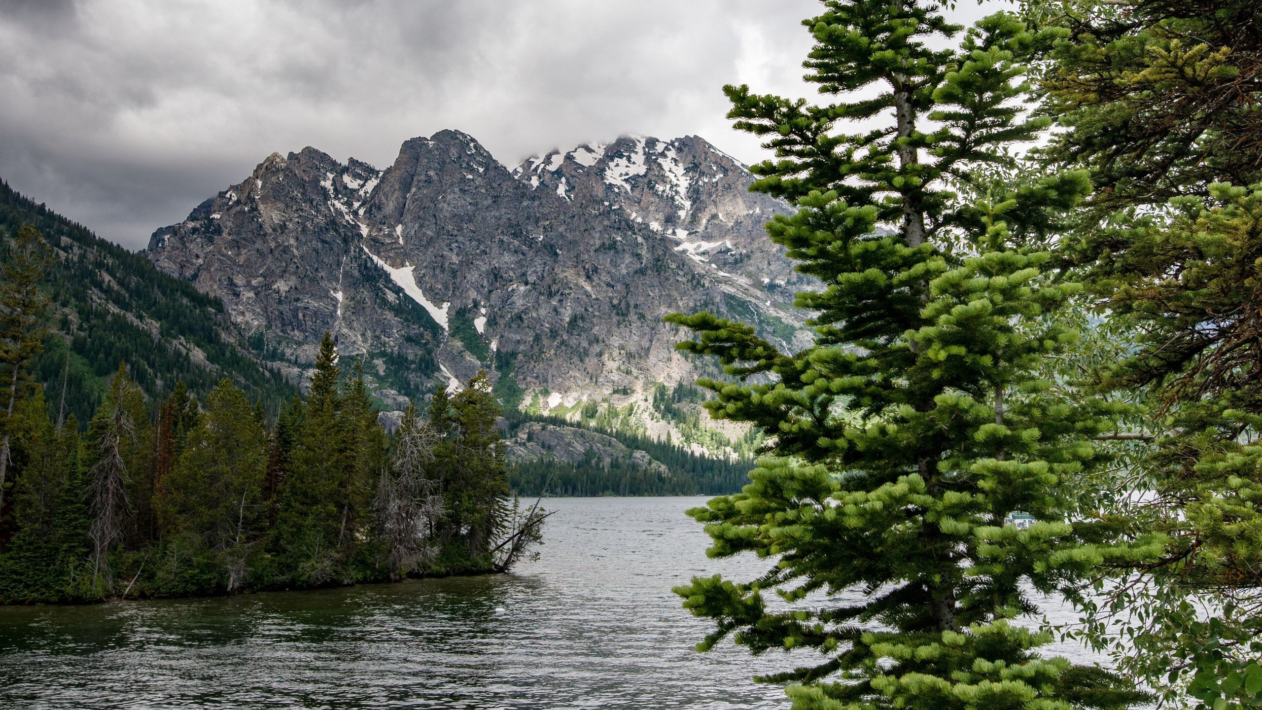Lake between the mountains in the forest Wallpaper 4k HD ID:10752